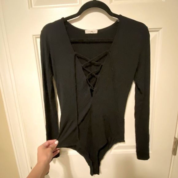 Vestique Tops Vestiqueblack Bodysuit W Front Cross Tie M Poshmark